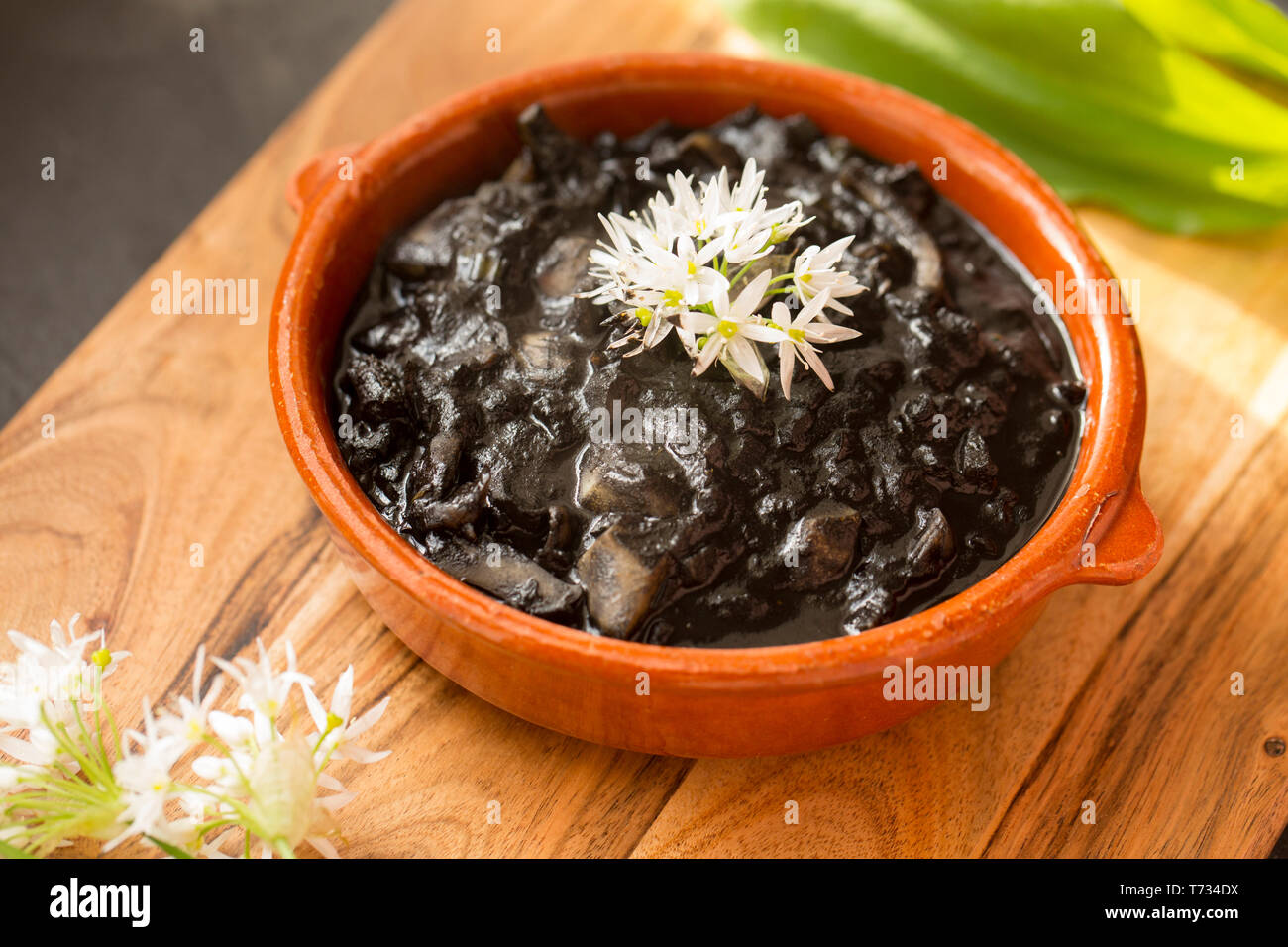 A bowl of freshly prepared cuttlefish, Sepia officinalis, from a ...