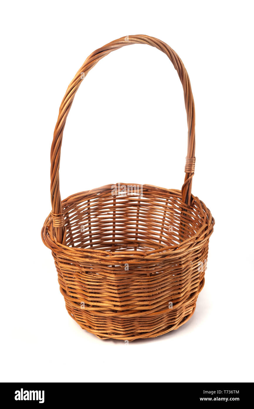 Empty wicker basket for fruits and vegetables isolated on white ...