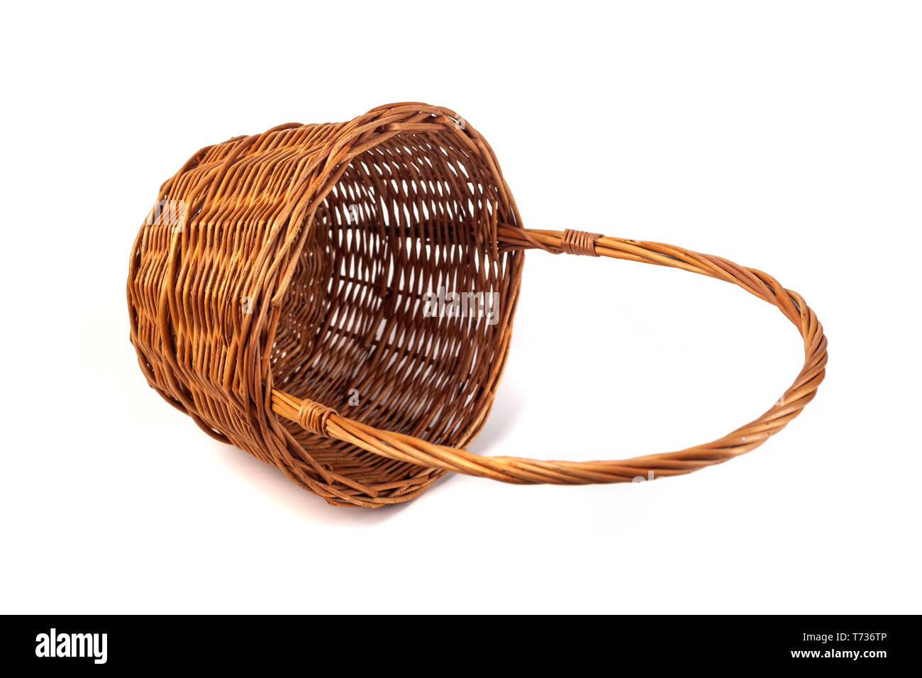 Empty wicker basket for fruits and vegetables isolated on white ...