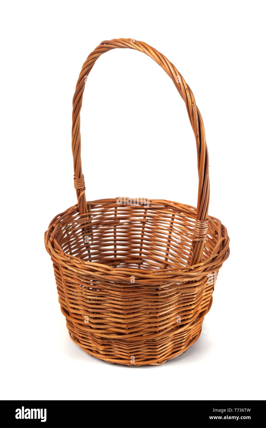 Empty wicker basket for fruits and vegetables isolated on white ...