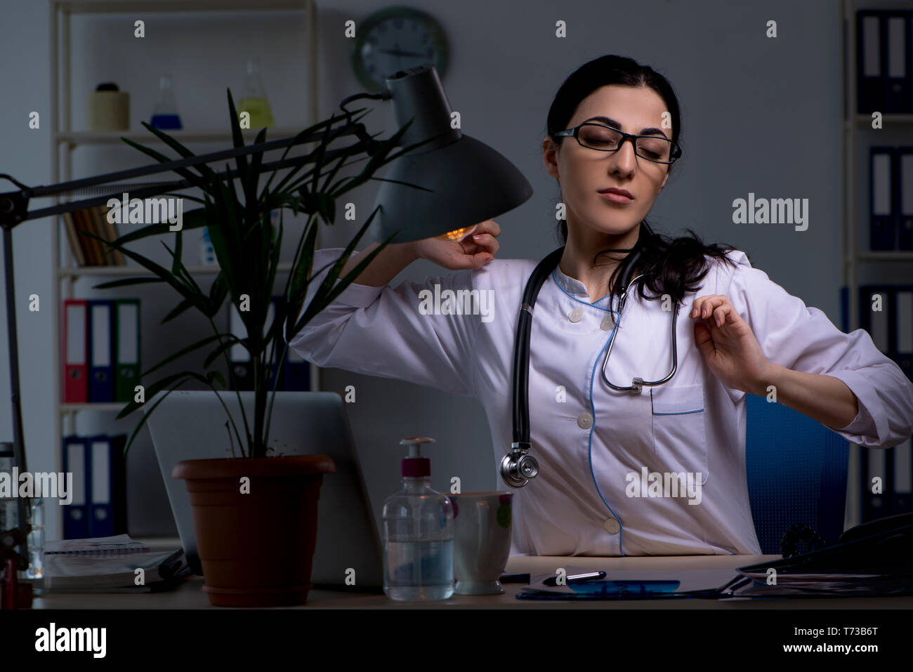Female doctor night shift hi-res stock photography and images - Alamy