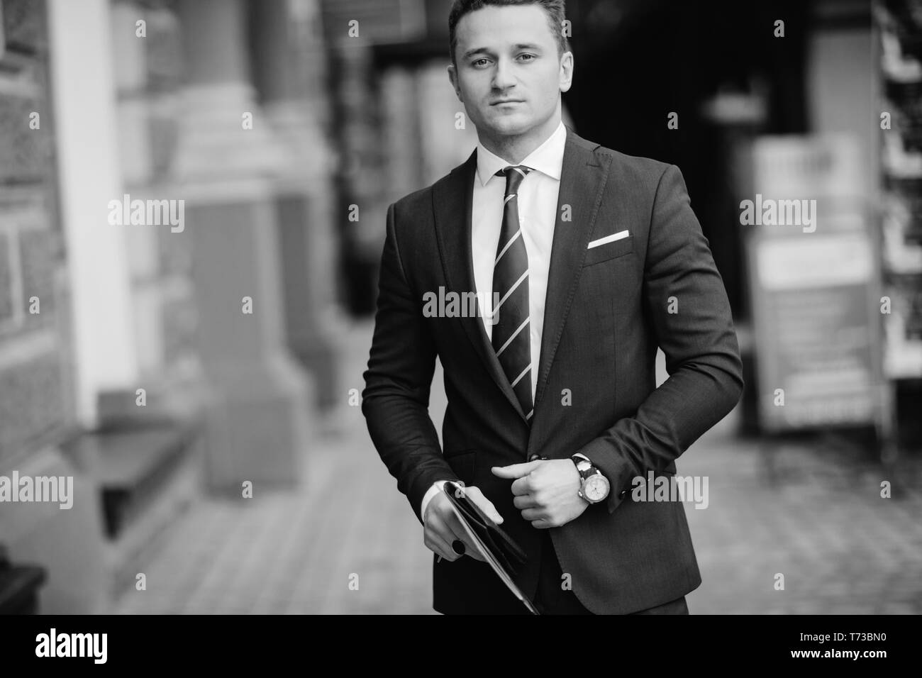 Man stands in stylish Black and White Stock Photos & Images - Alamy