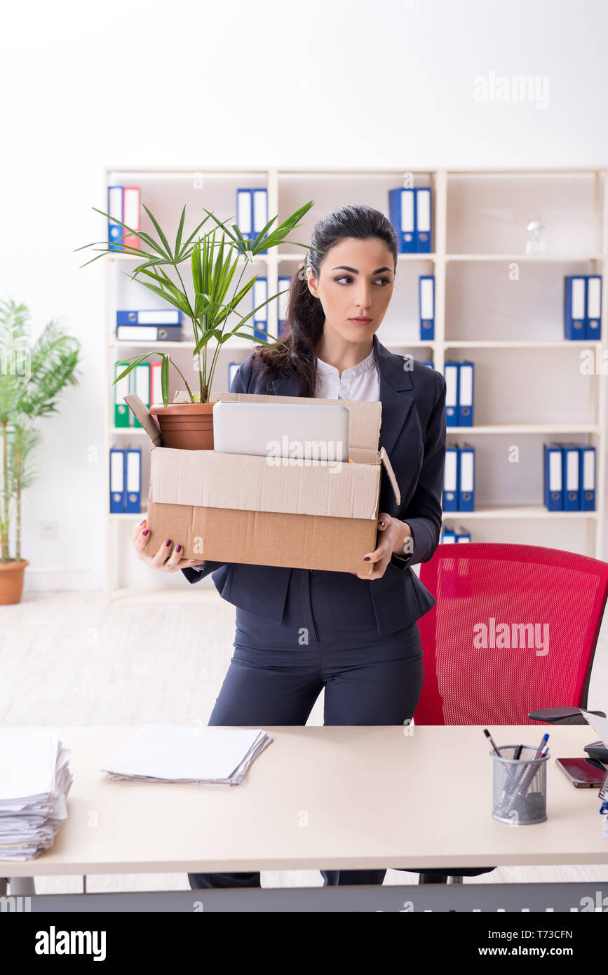 Young female employee being fired from her work Stock Photo - Alamy