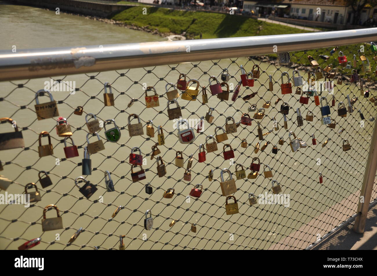 Locks on a fence above the river Stock Photo - Alamy