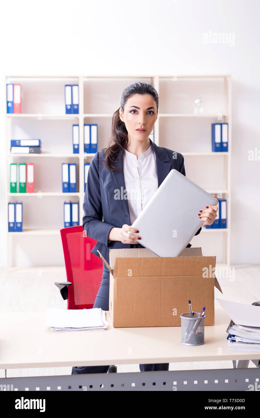 Young female employee being fired from her work Stock Photo - Alamy