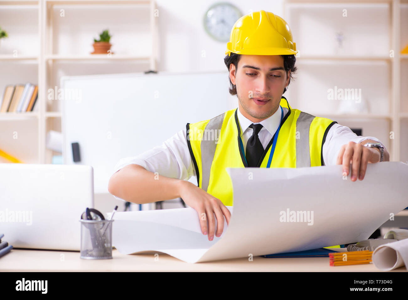 Male construction engineer working in the office Stock Photo - Alamy