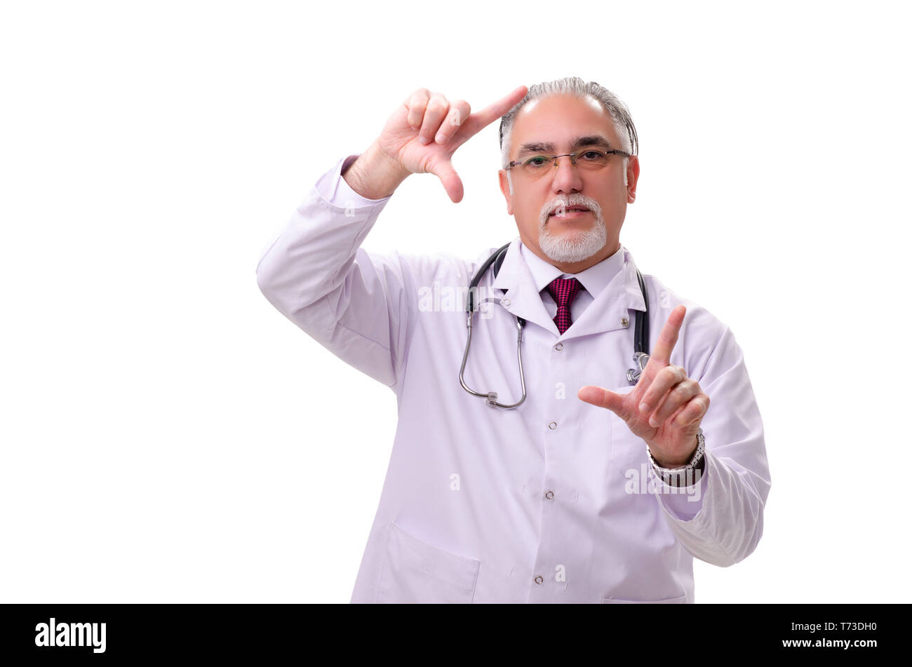 Old male doctor isolated on white Stock Photo - Alamy