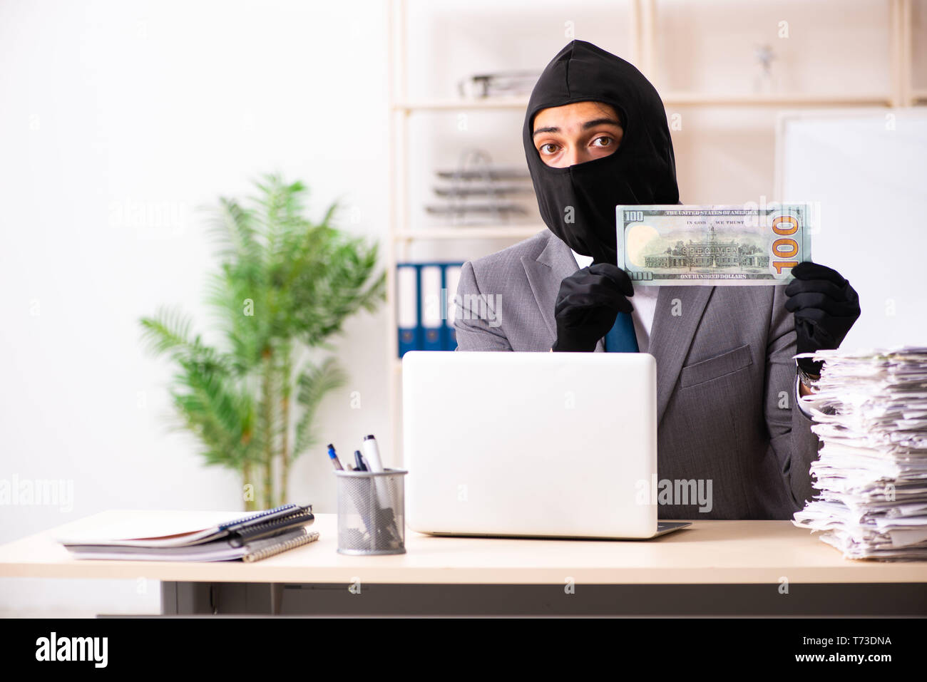 Office stealing hi-res stock photography and images - Alamy