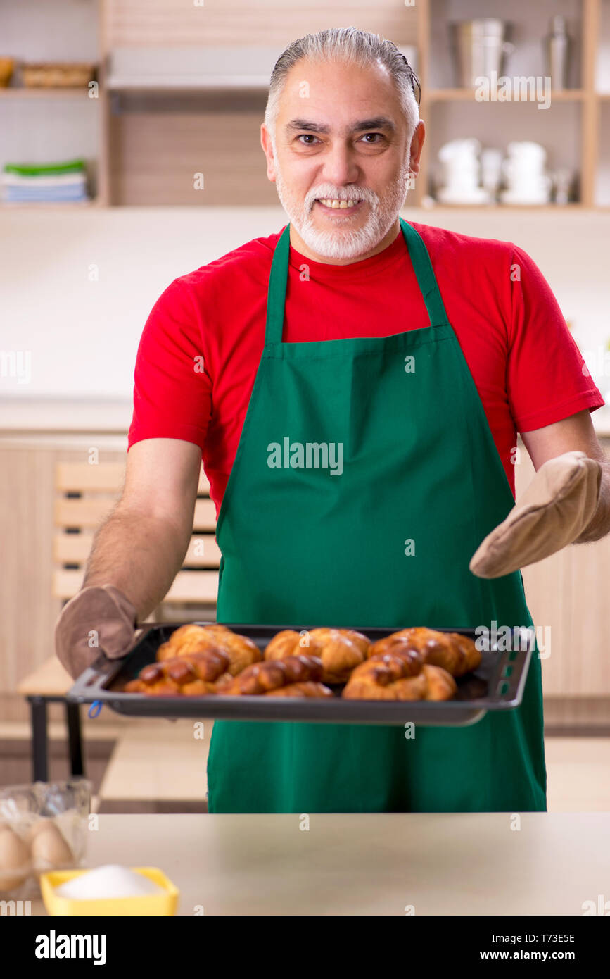 Old male baker working hi-res stock photography and images - Alamy