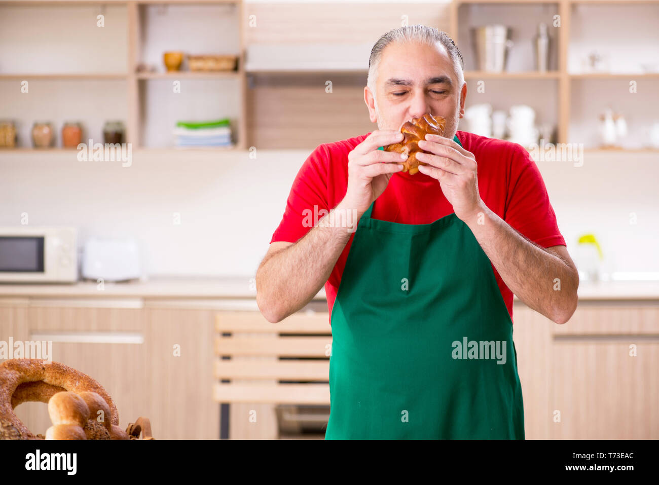 Old male baker working hi-res stock photography and images - Alamy