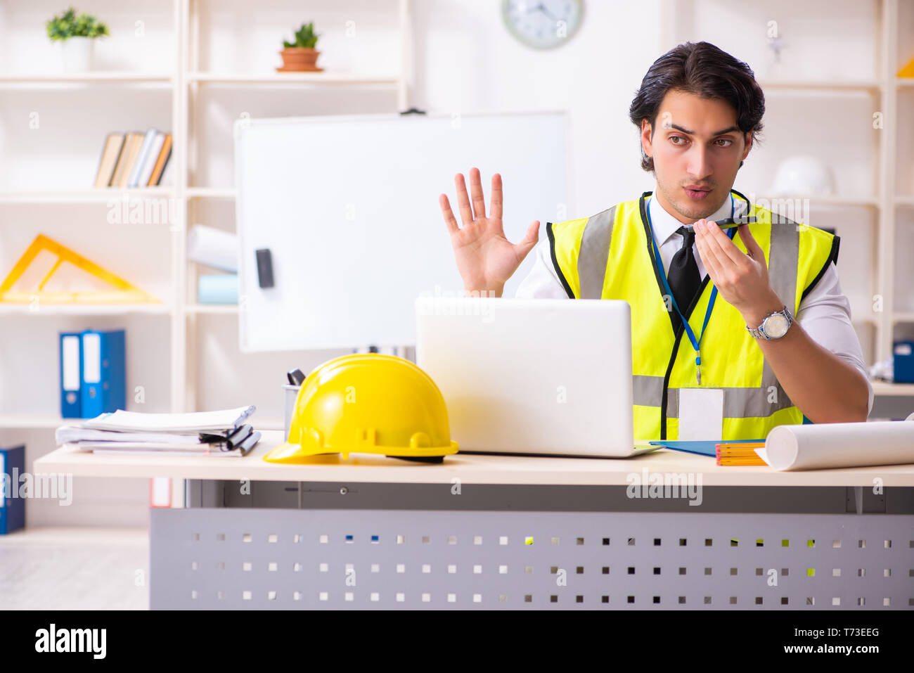 Male construction engineer working in the office Stock Photo - Alamy