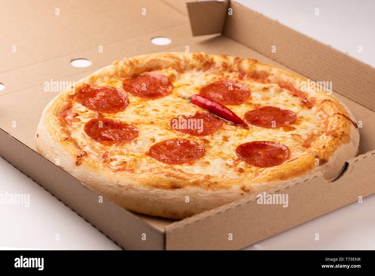Pepperoni Pizza in box Stock Photo - Alamy