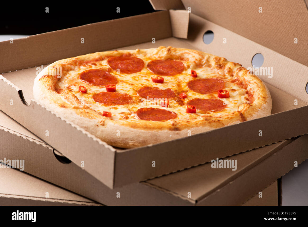 Pepperoni Pizza in box Stock Photo - Alamy
