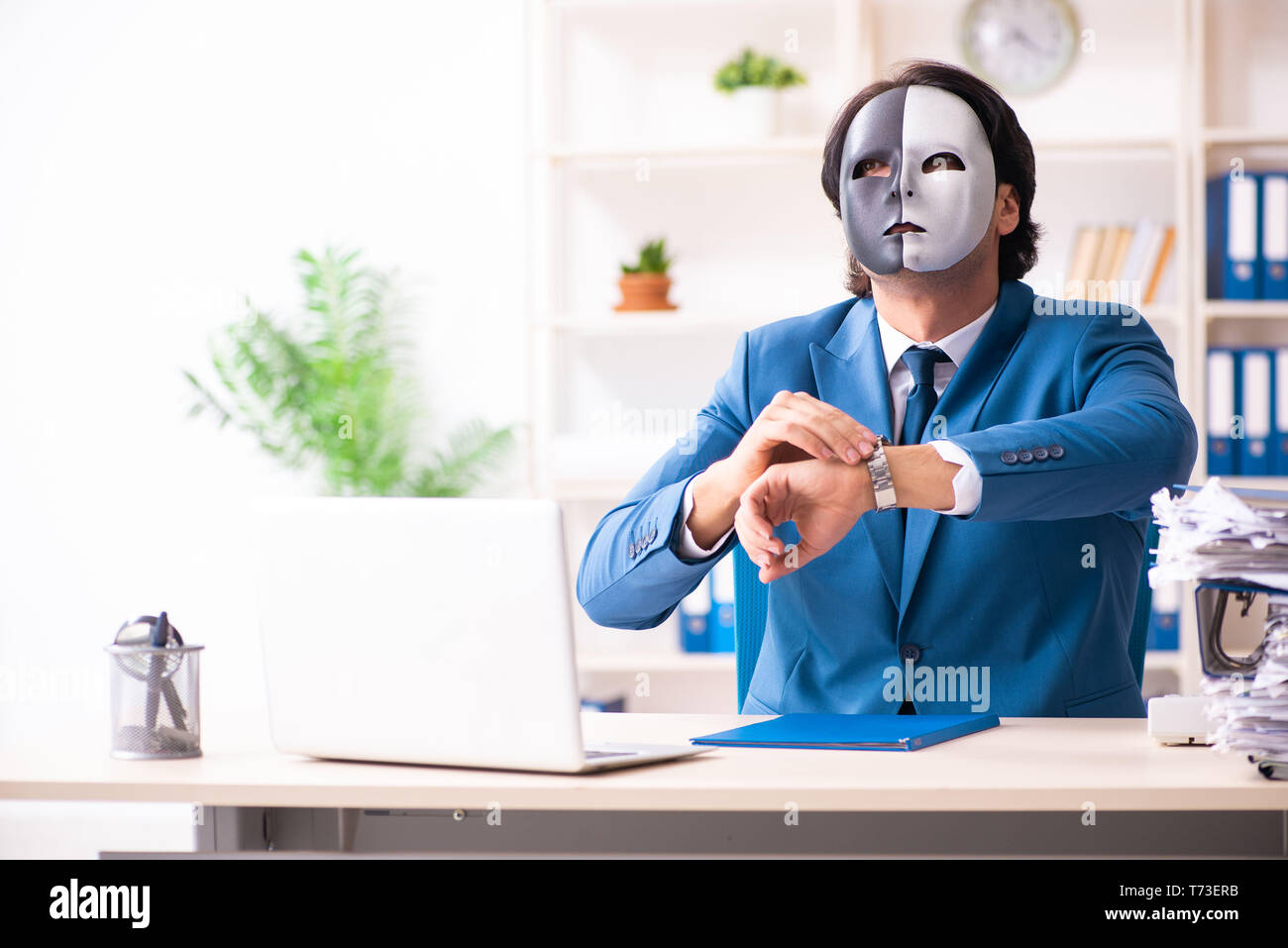 Male employee in the office in industrial espionage concept Stock Photo ...