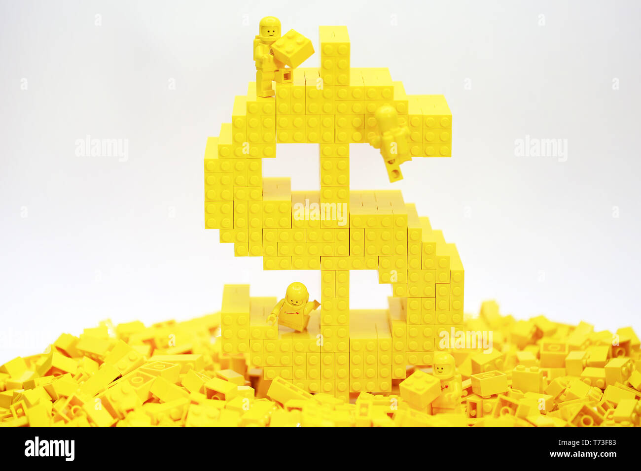 brick wall broken discover the dollar sign Stock Photo - Alamy