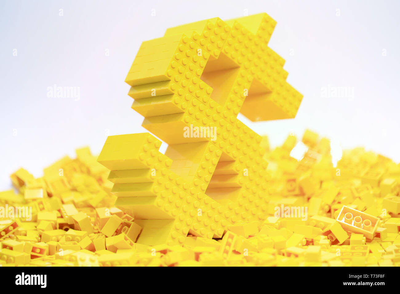 brick wall broken discover the dollar sign Stock Photo - Alamy