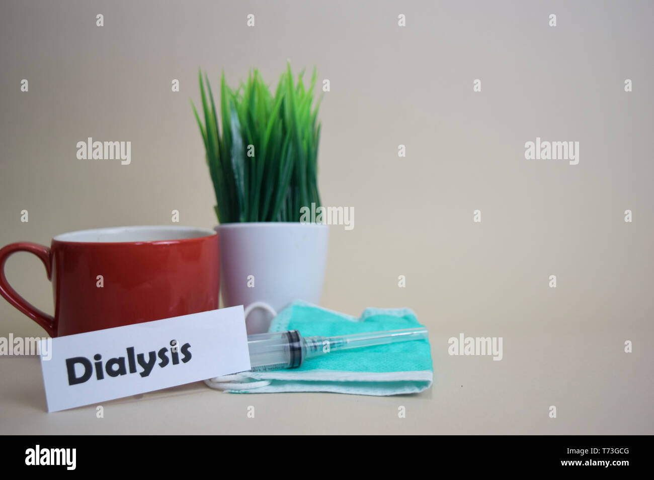 Dialysis text, grass pot, coffee cup, syringe, and face green mask ...