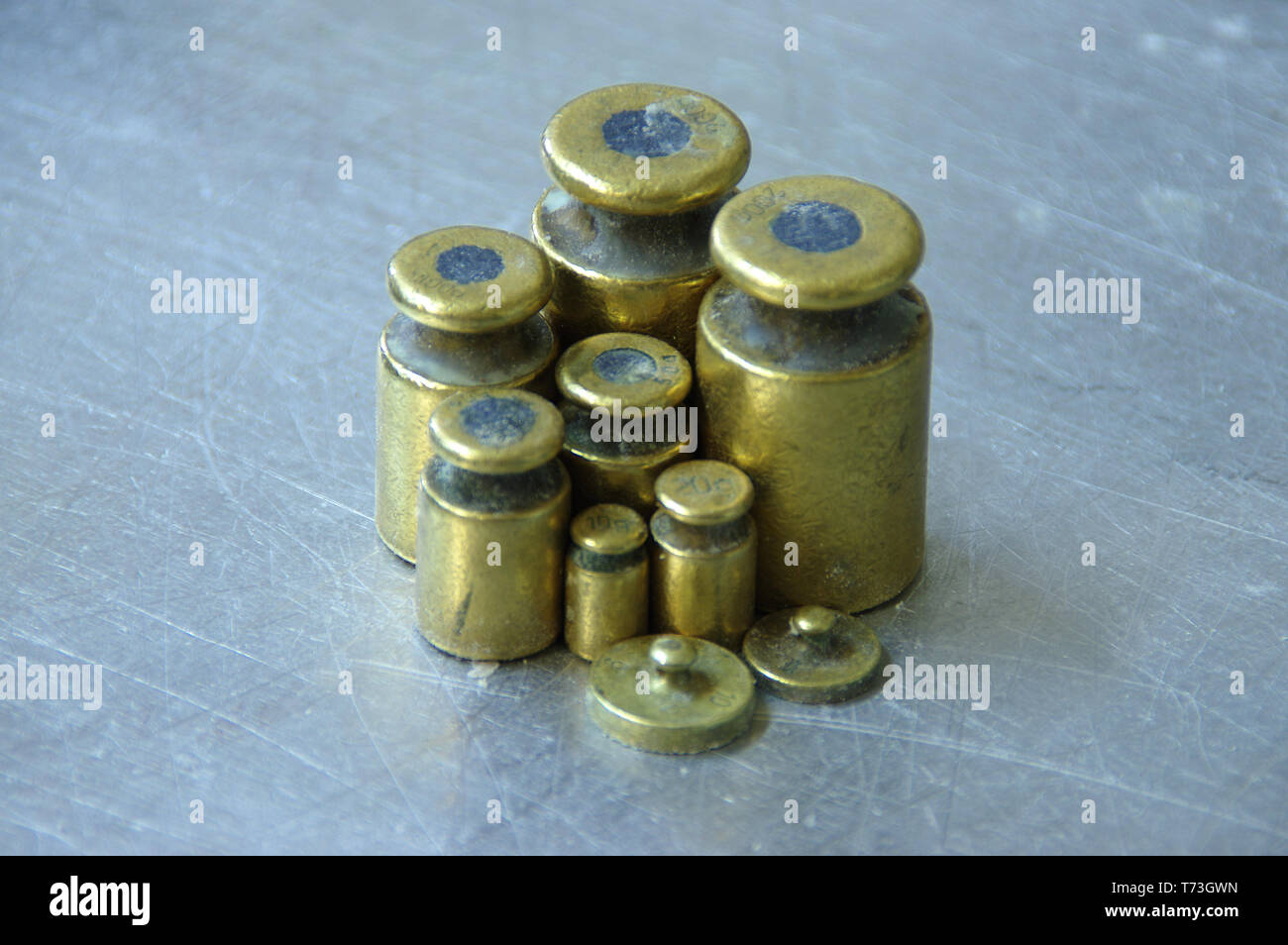 A set of old used vintage weights. Measurements of grams and kilograms ...