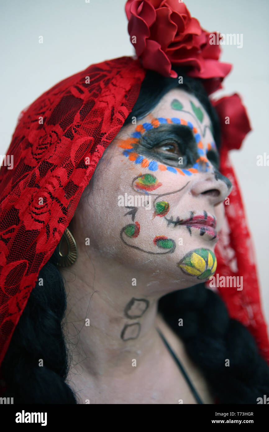 a woman characterized as Catrina pose for photo in Sao Paulo Stock ...