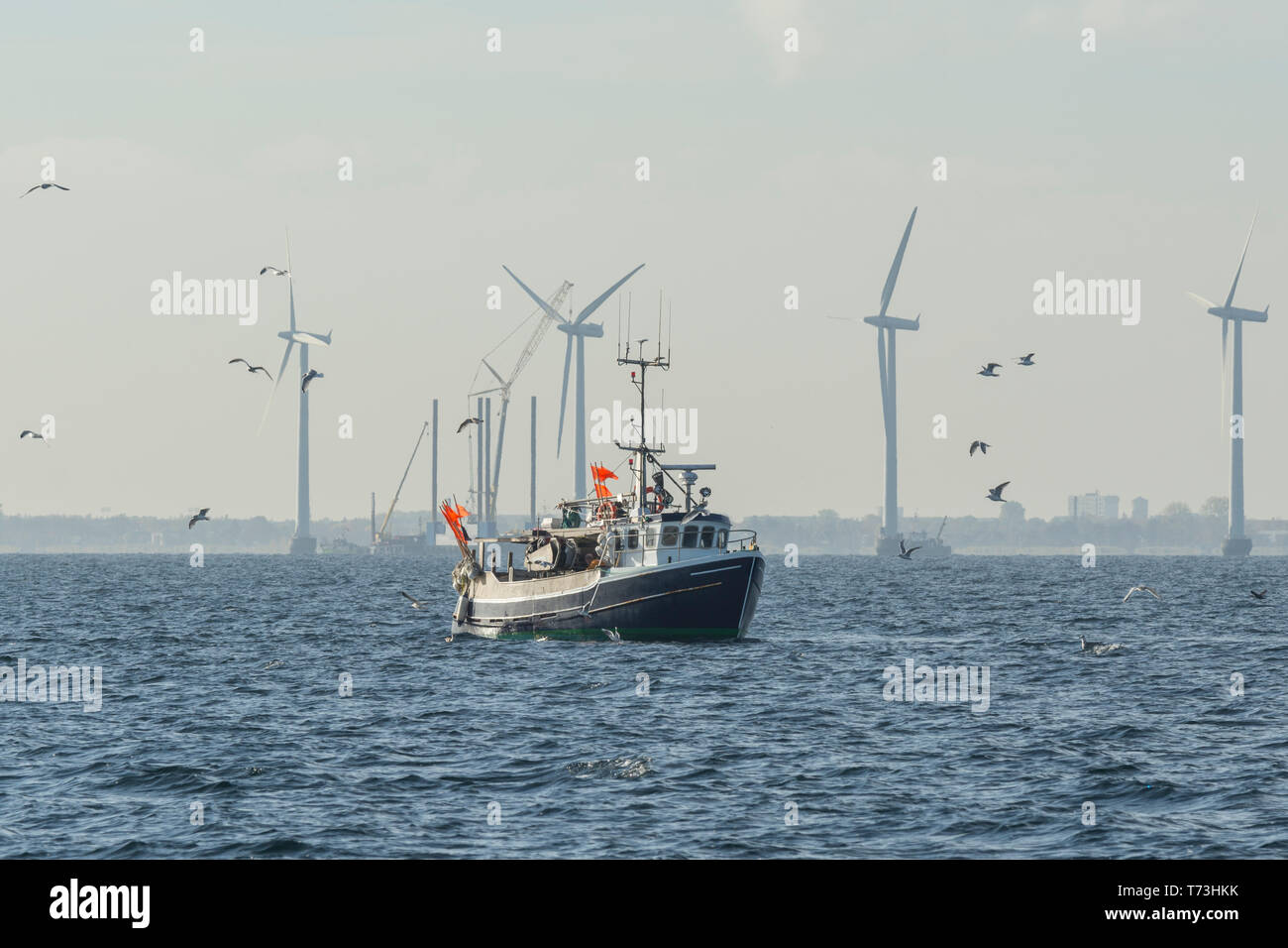 Wind turbines fishing boat hi-res stock photography and images - Alamy