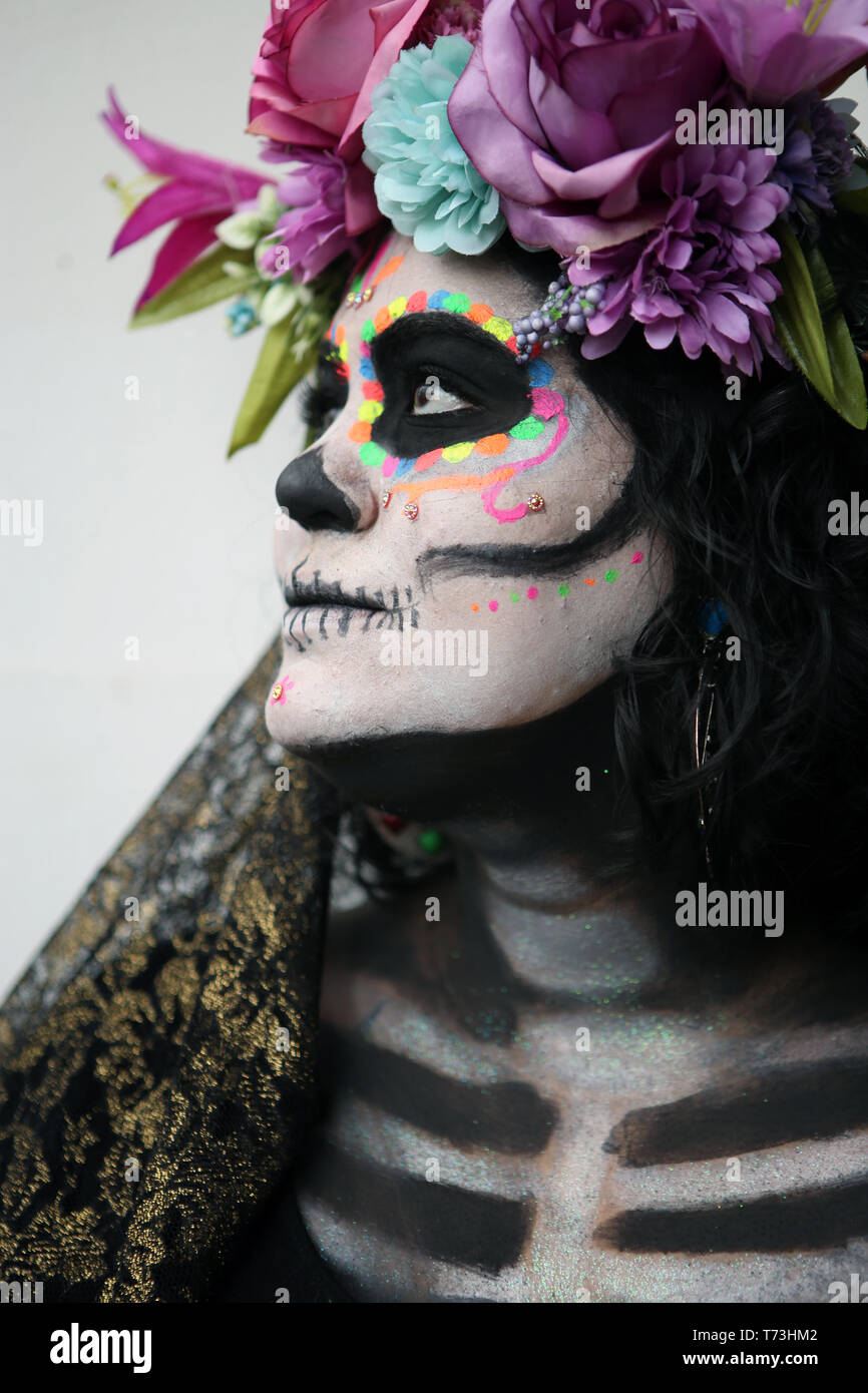 a woman characterized as Catrina pose for photo in Sao Paulo Stock ...