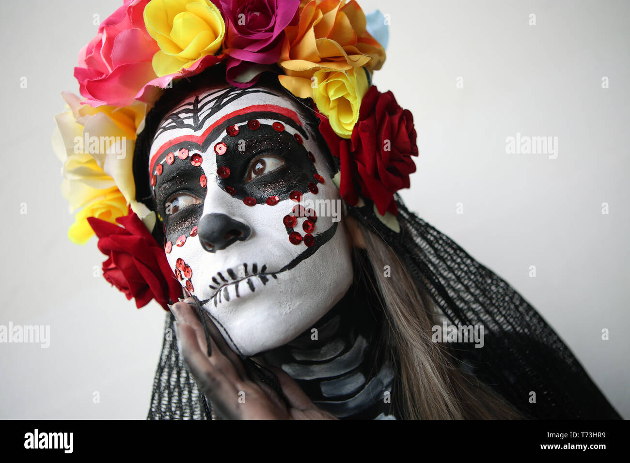 a woman characterized as Catrina pose for photo in Sao Paulo Stock ...