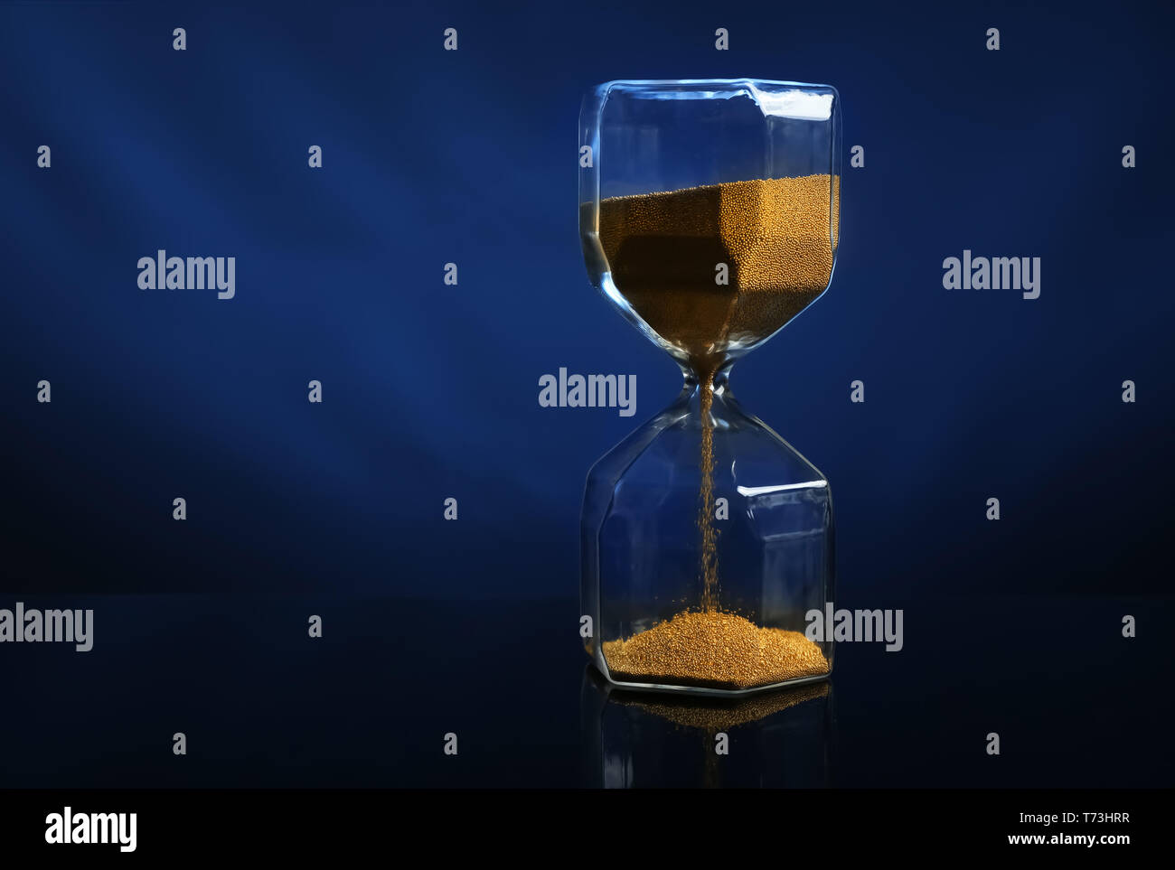 Hourglass on color dark background. Time management concept Stock Photo ...
