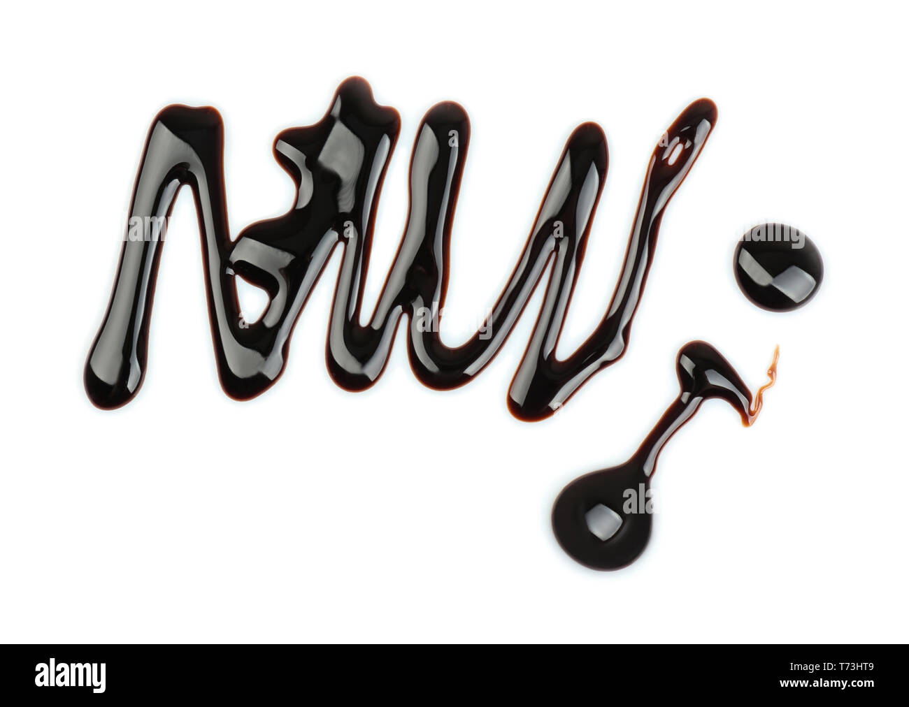 Chocolate syrup on white background Stock Photo - Alamy