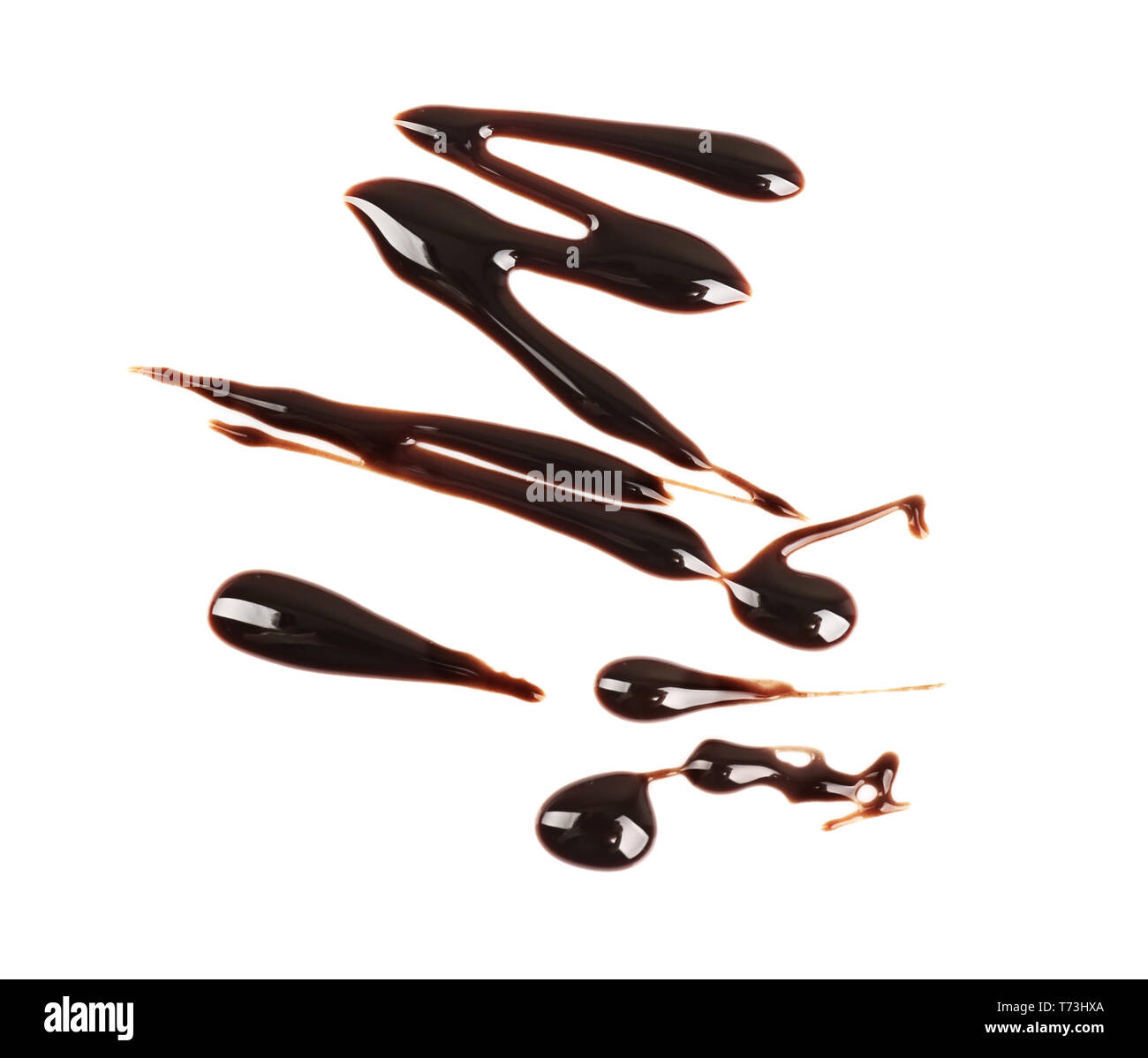 Pattern made of chocolate syrup on white background Stock Photo - Alamy