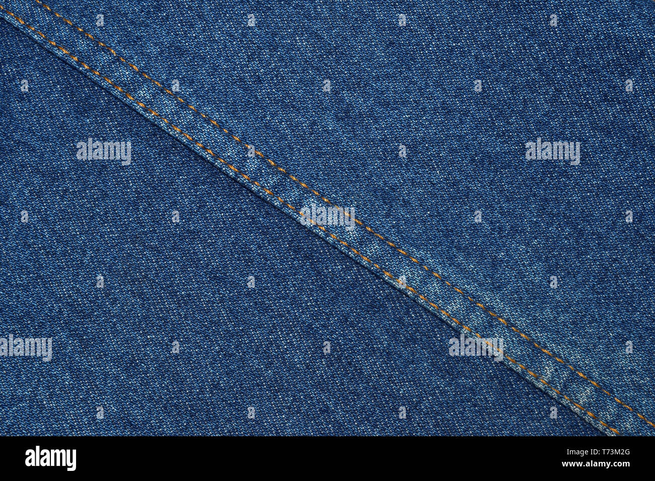 textured background of denim with vertical and diagonal seam Stock ...