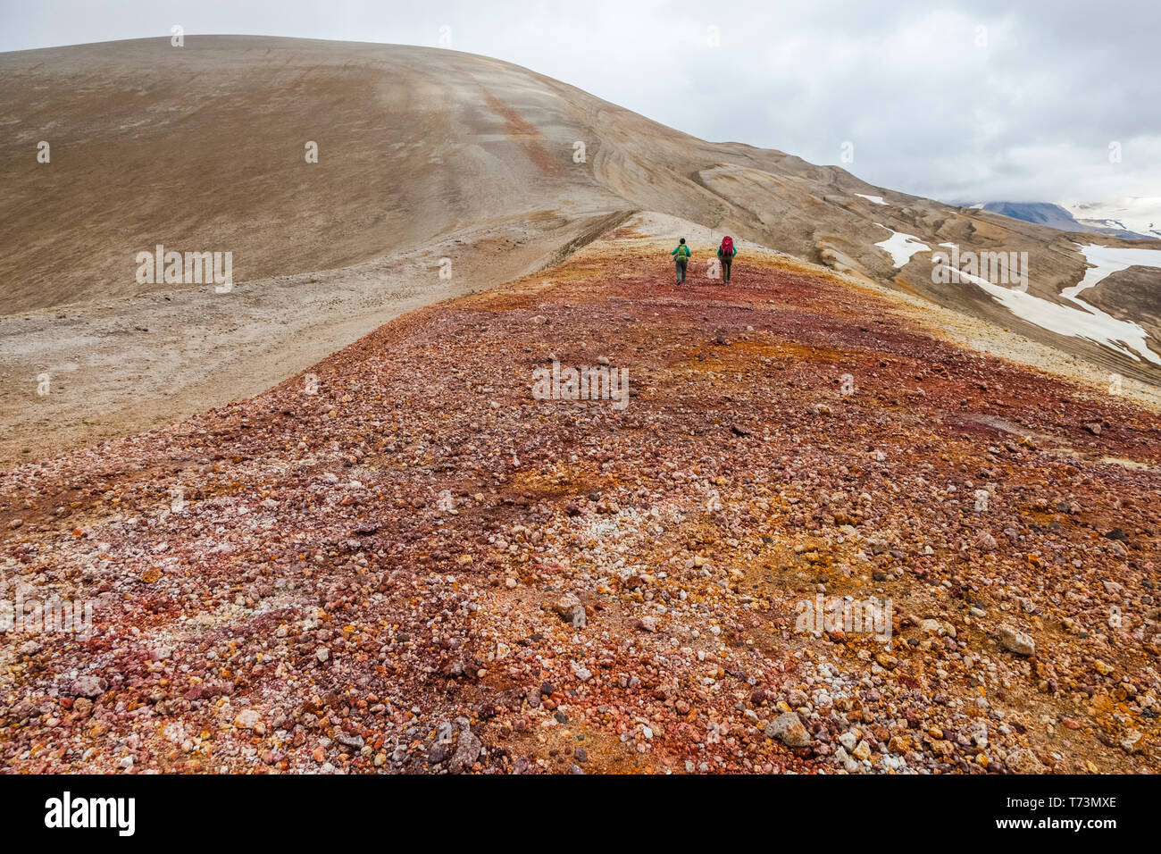 Two women backpacking on a ridge headed up Broken Mountain in the ...