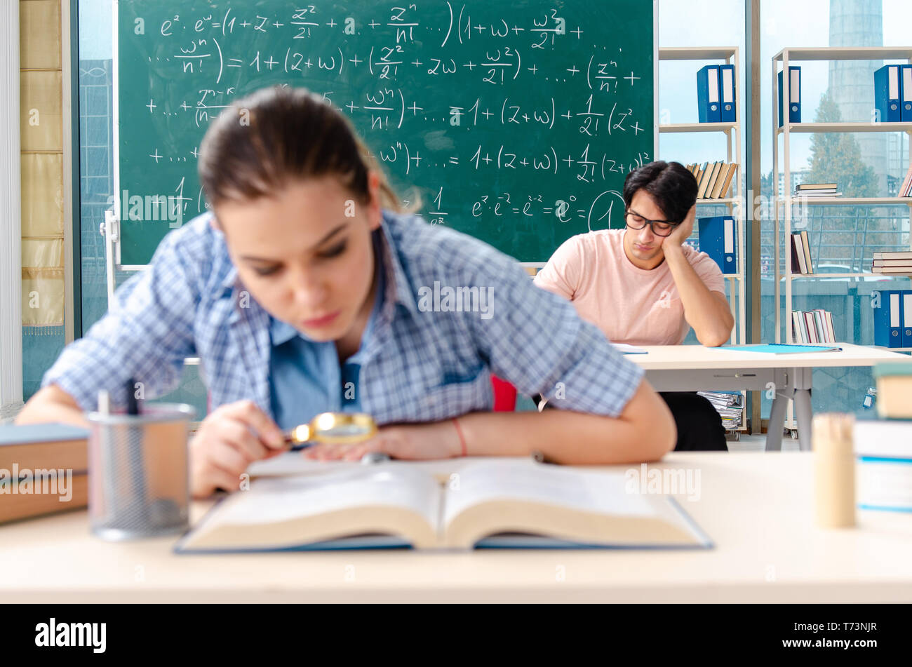 Young students taking the math exam in classroom Stock Photo - Alamy