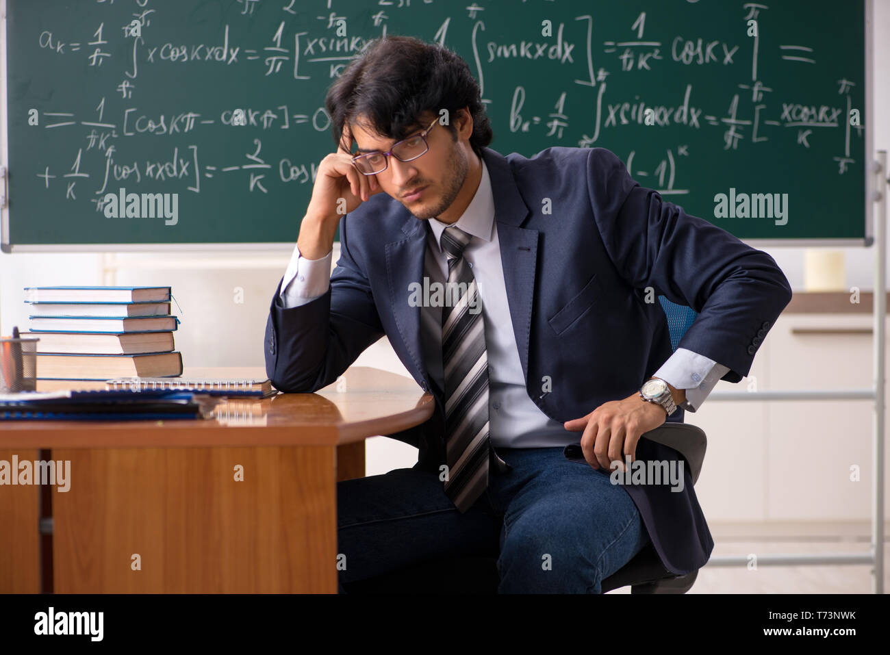 Exhausted Teacher In Classroom High Resolution Stock Photography and ...