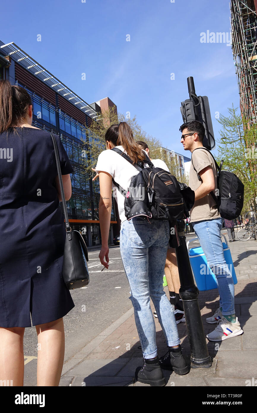 Young people crossing road in hi-res stock photography and images - Alamy