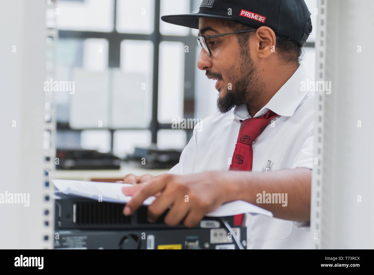 Portrait of Indian computer engineering moving and config network ...