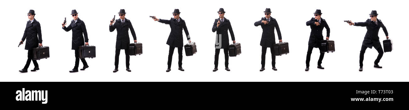 Man spy with handgun isolated on white background Stock Photo - Alamy