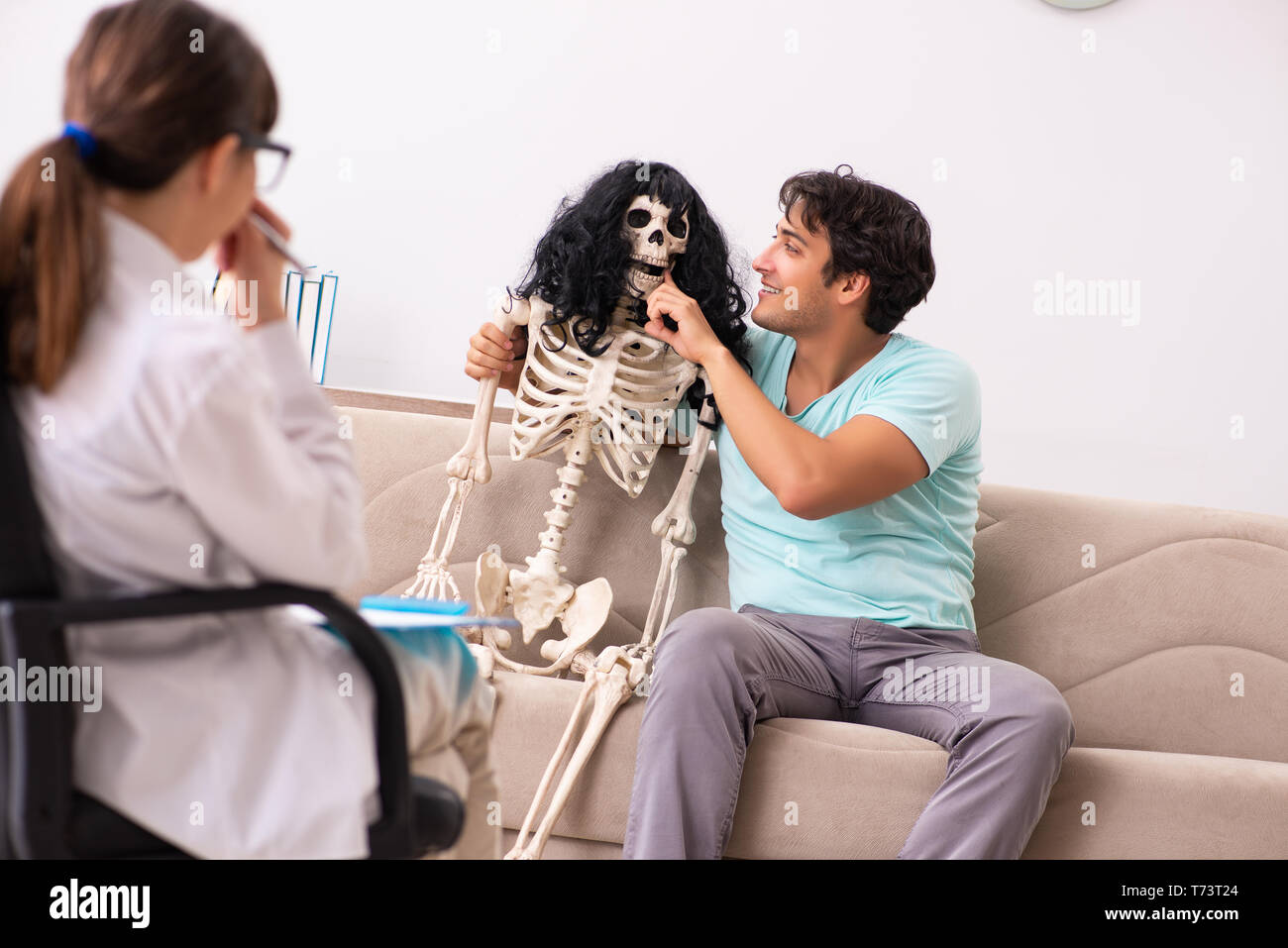 Young patient visiting psychologist for therapy Stock Photo - Alamy