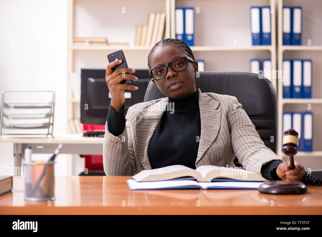 Black female lawyer in courthouse Stock Photo - Alamy