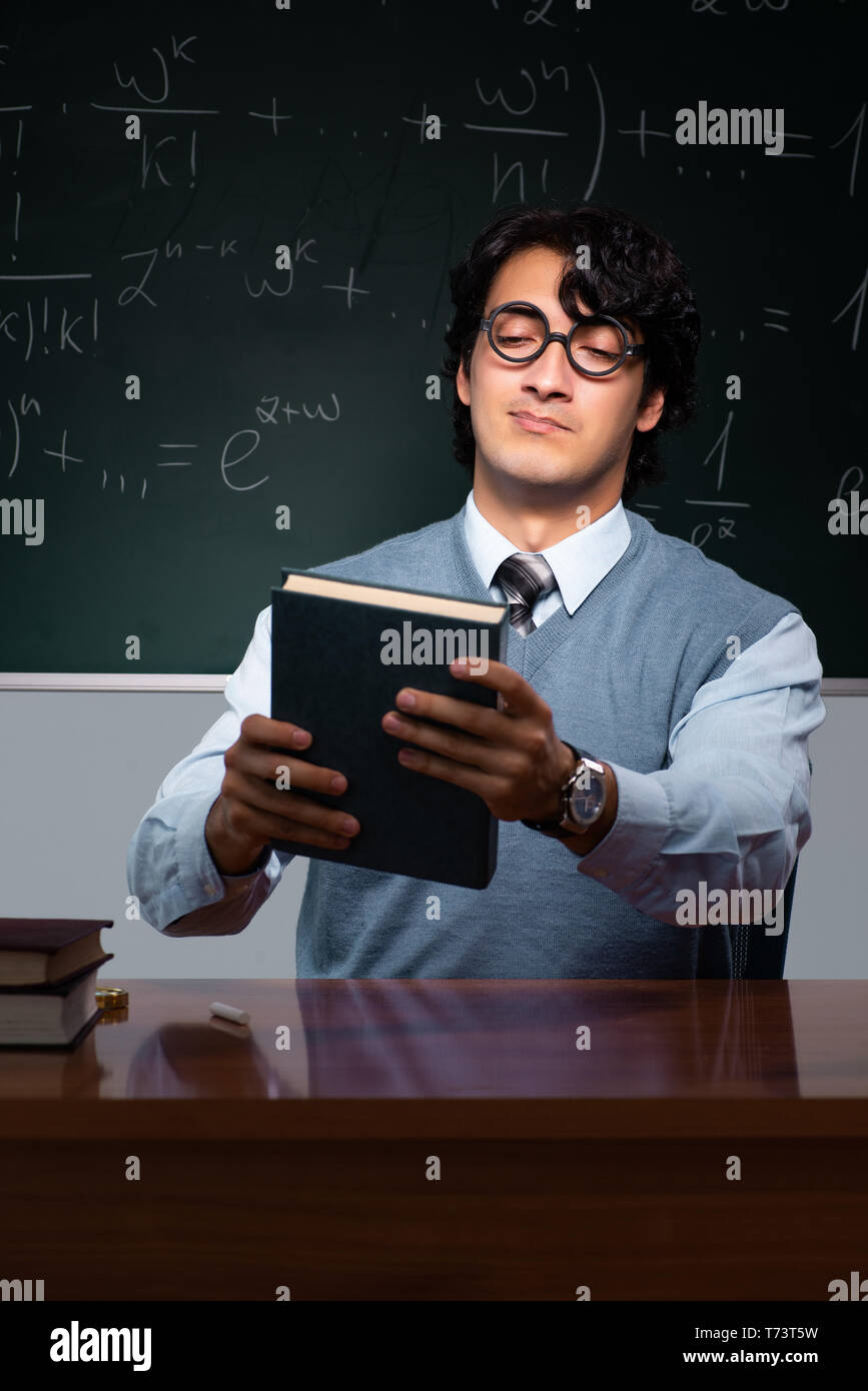 Man in front of blackboard math hi-res stock photography and images - Alamy