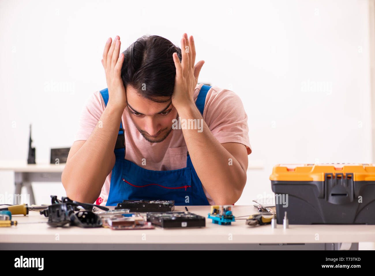 Upset engineer in computer center hi-res stock photography and images ...