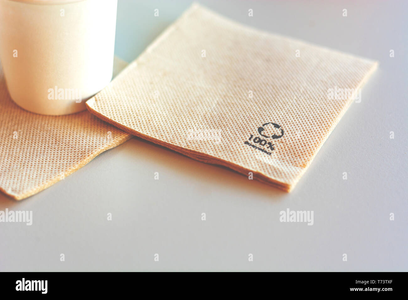 Disposable napkin made from recycled paper. Environmental protection ...