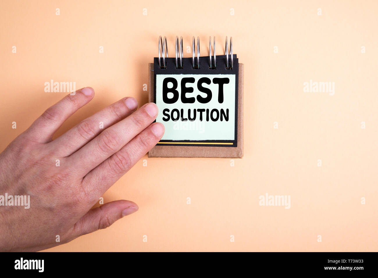 Best Solution concept. Woman's hand and note pad Stock Photo - Alamy