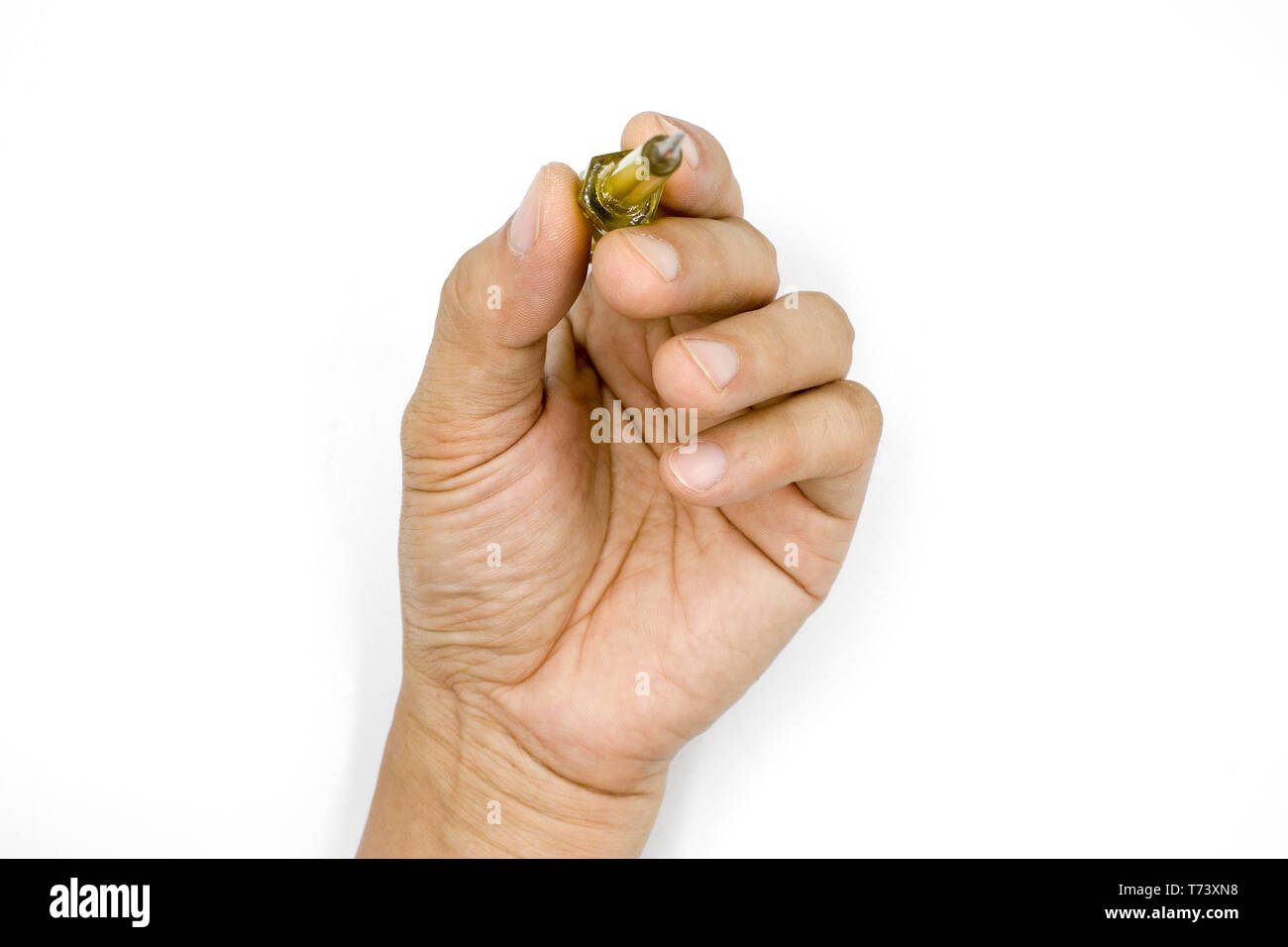 Male hand holding electric tester screwdriver to check the electrical ...