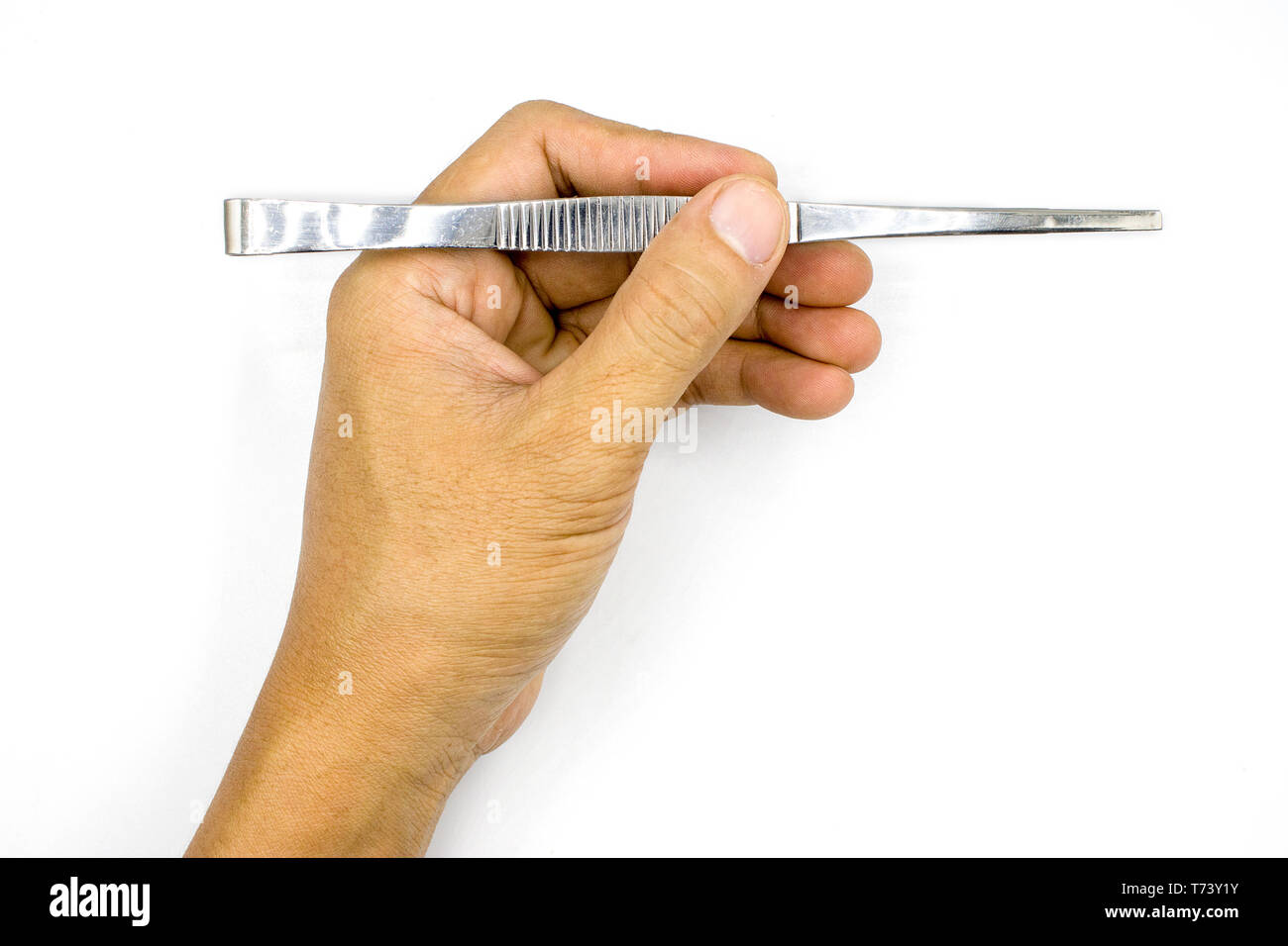 A male hand holding Tweezers, medical pinsetter, man hand isolated on ...