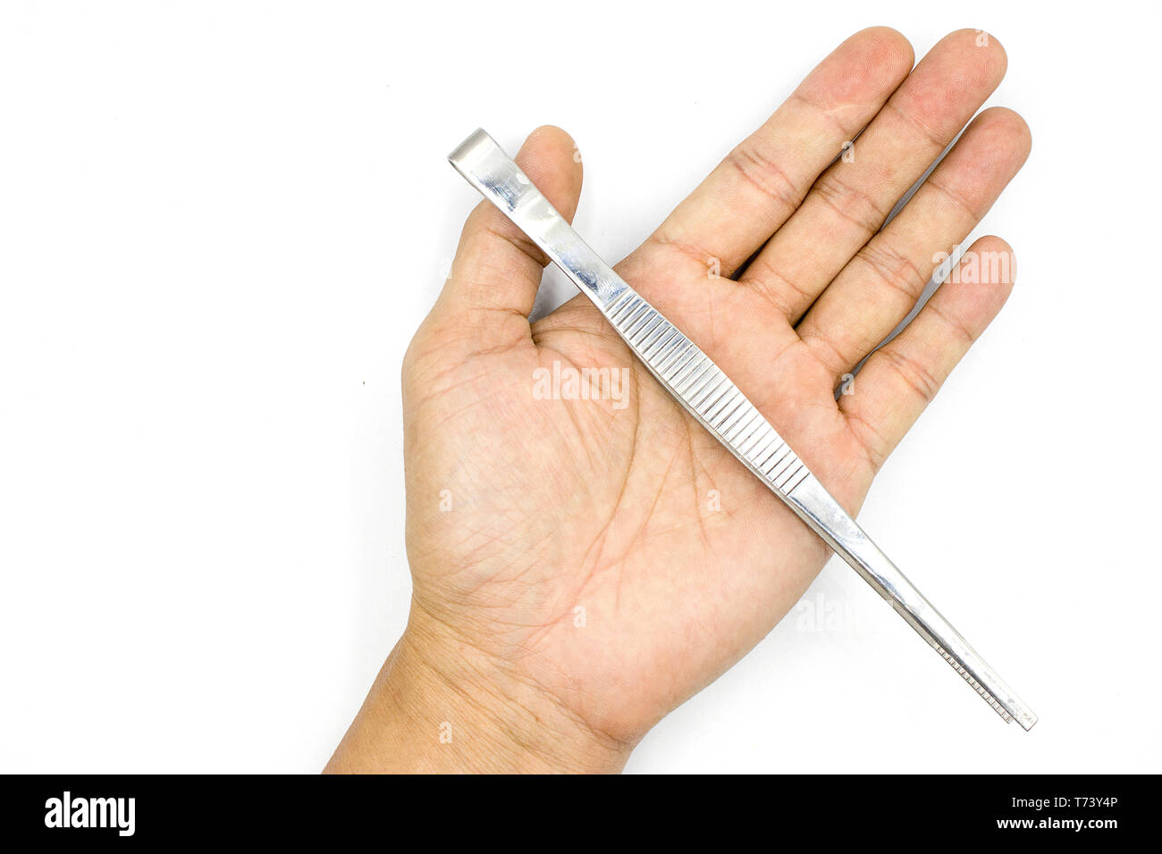 A male hand holding Tweezers, medical pinsetter, man hand isolated on ...