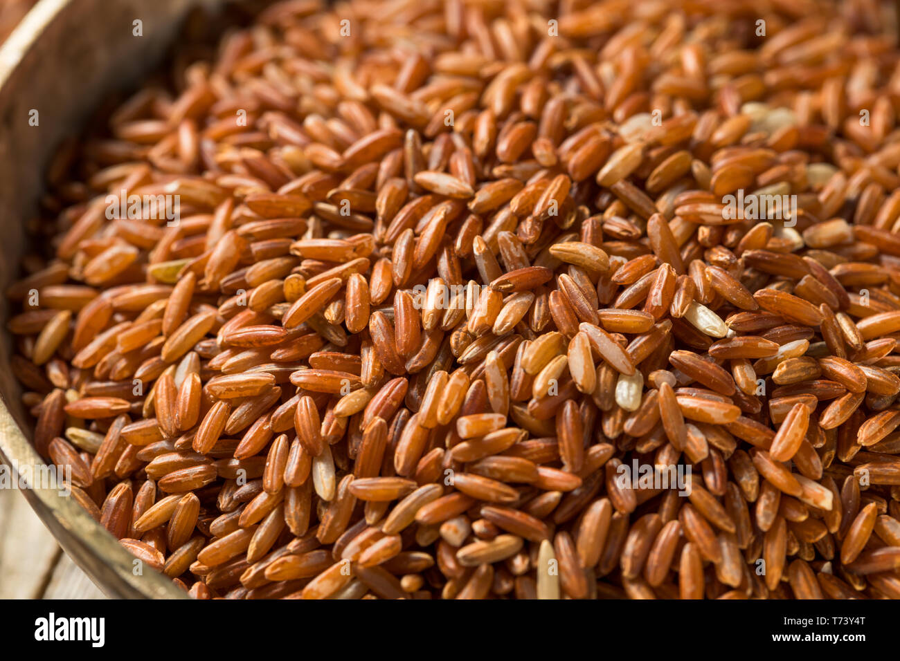 Dry Organic Red Rice in a Bowl Stock Photo - Alamy