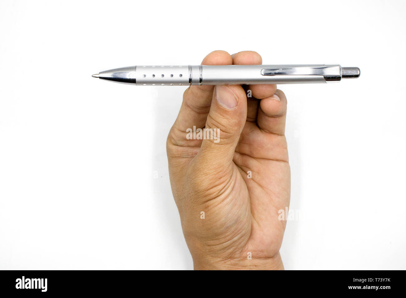 A male hand holding pen, man hand isolated on white background High ...