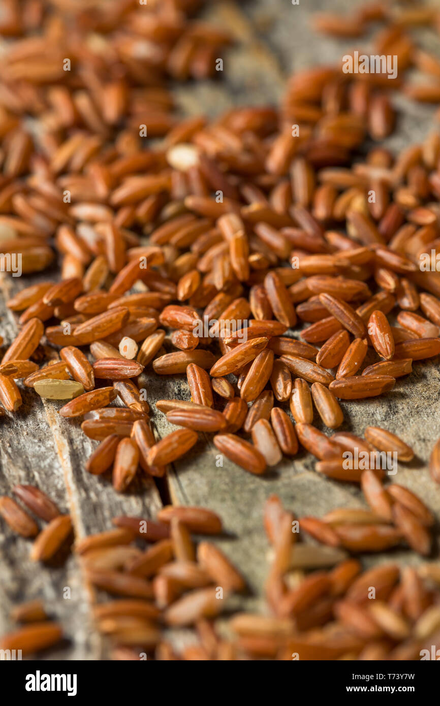 Spoon raw red rice hi-res stock photography and images - Alamy