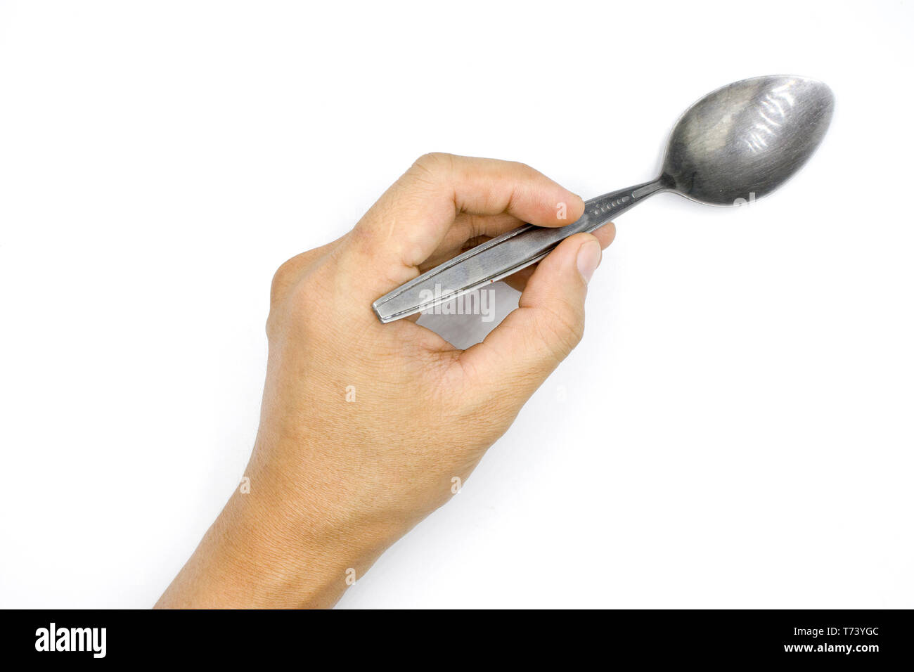A male hand holding spoon, man hand isolated on white background High ...