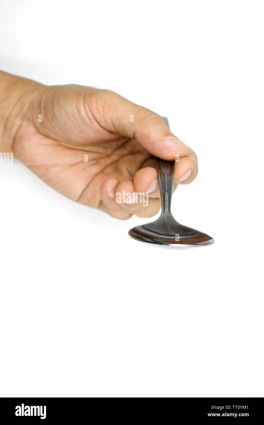 A male hand holding spoon, man hand isolated on white background High ...